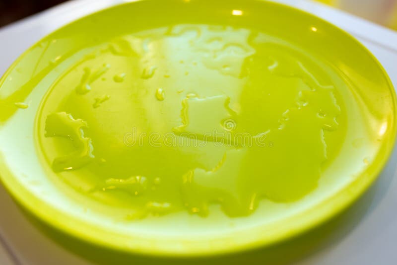Water in a green plate stock photo. Image of kitchen - 213130924