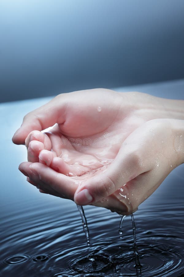 Hands under water drops stock photo. Image of concepts - 8912612