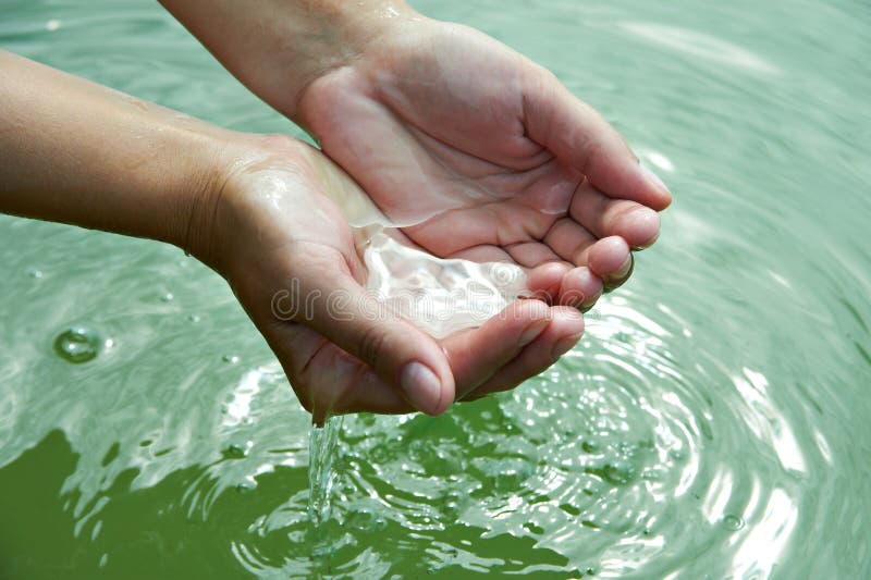 Handful of water stock image. Image of female, purity - 15729771