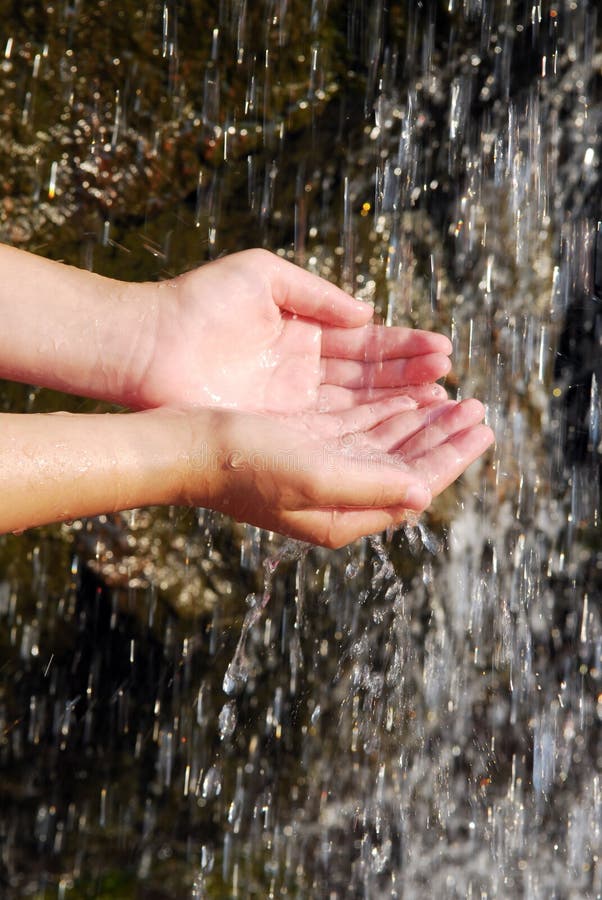 Handful of water stock image. Image of female, purity - 15729771