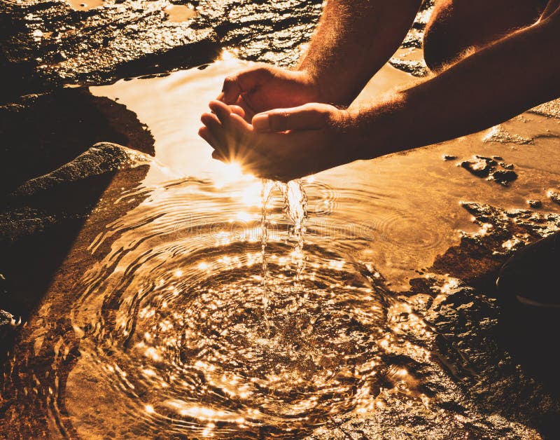 Water in the hands stock image. Image of reserve, aqua - 269618373