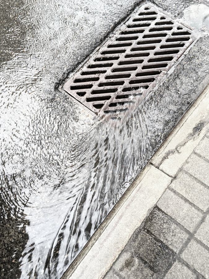 Water from Heavy Rain Flows into a Sewer Drain Stock Photo - Image of ...