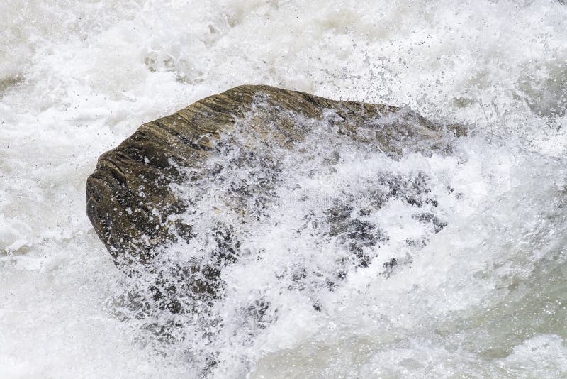 Water hitting rock stock photo. Image of awash, crash - 55067512