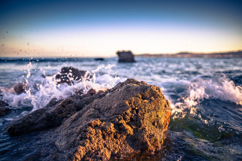 Water hitting rocks stock photo. Image of vacations - 117477430