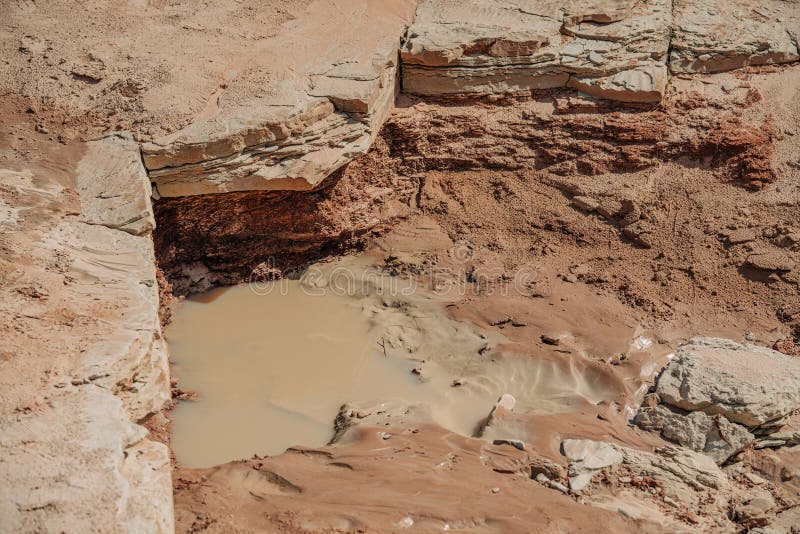 Water Hole in Rocks in Desert after Rain Stock Image - Image of geyser ...