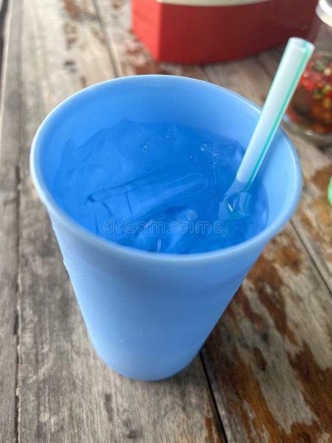 Water and ice in blue cup stock photo. Image of fresh - 330112380