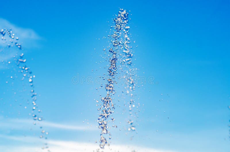 Water Jet of Fountain on Blue Sky Background Stock Image - Image of ...