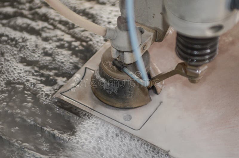 Water jet machine at work stock photo. Image of pressure - 183950122