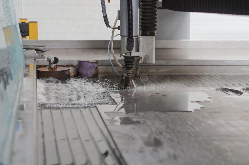 Water jet machine at work stock photo. Image of automatic - 183950160