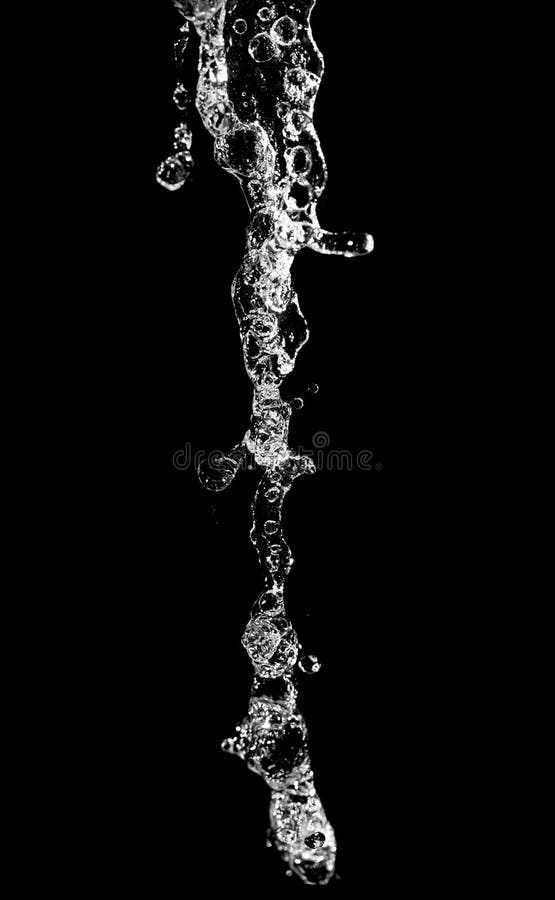Water Jet with Spray on a Black Background Stock Image - Image of white ...