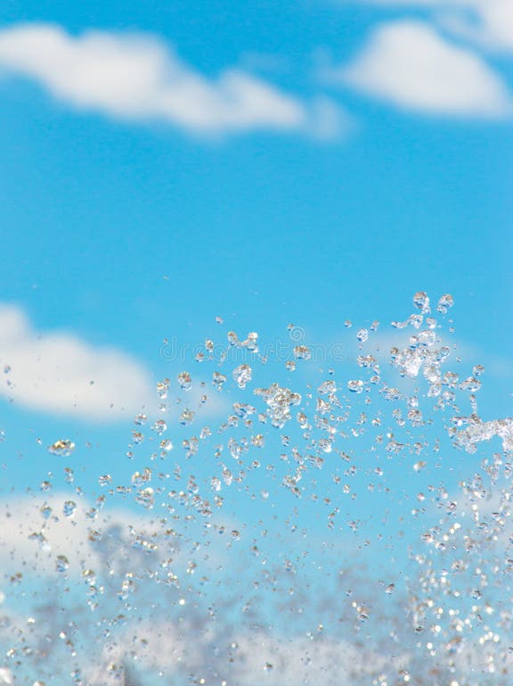 Water Jet with Spray on the Sky Background Stock Image - Image of color ...