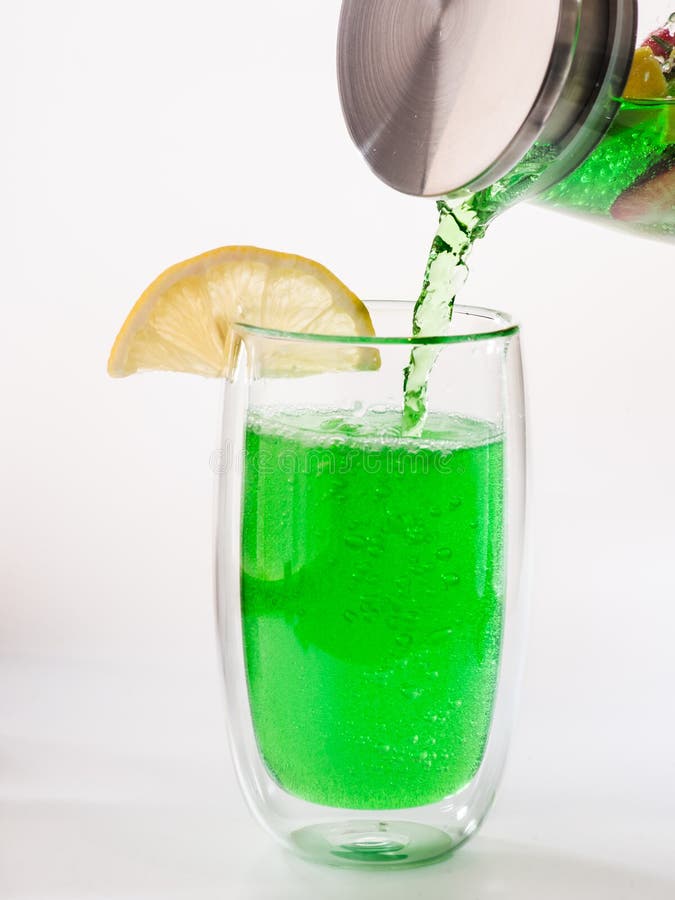 Water from Jug Pouring into Glass on Wooden Table Outdoors Stock Image ...