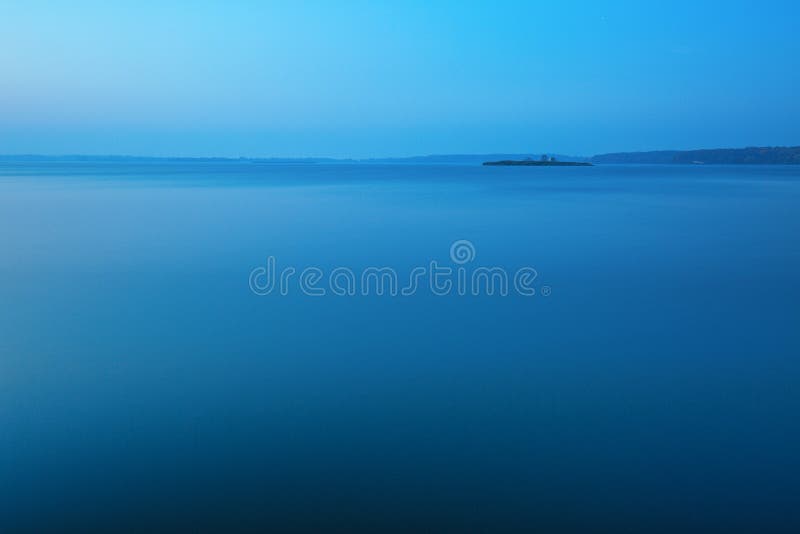 Water Landscape with Small Island in the Distance Stock Photo - Image ...