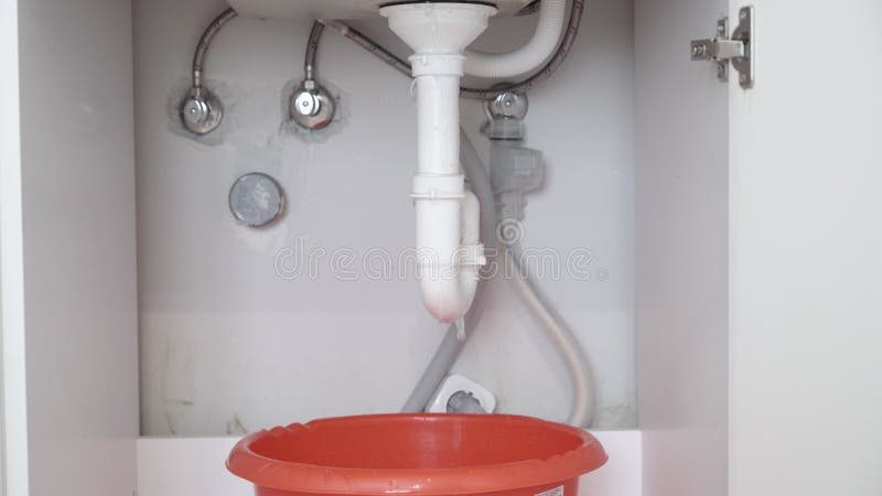 Water Leaking from Broken Kitchen Sink Pipe with Siphon Problem Close ...