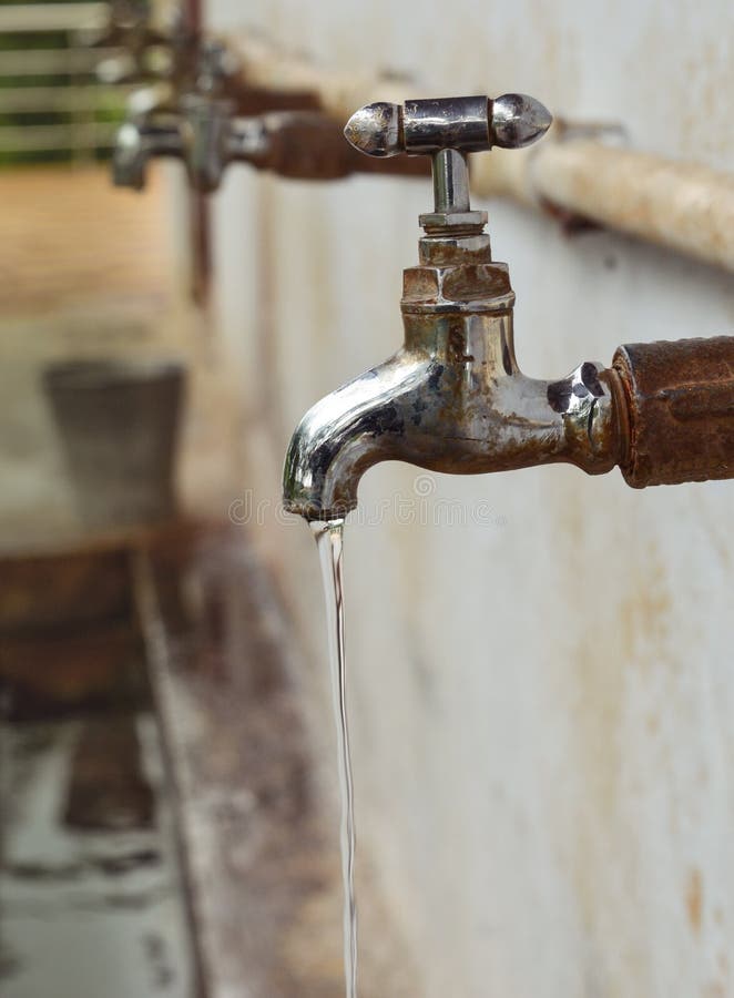 Water Leaking through a Tap. Stock Photo - Image of waterwastage ...