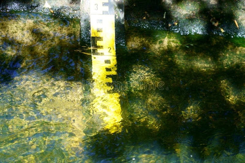 Water Level Depth Meter in a River Stock Image - Image of plant, light ...