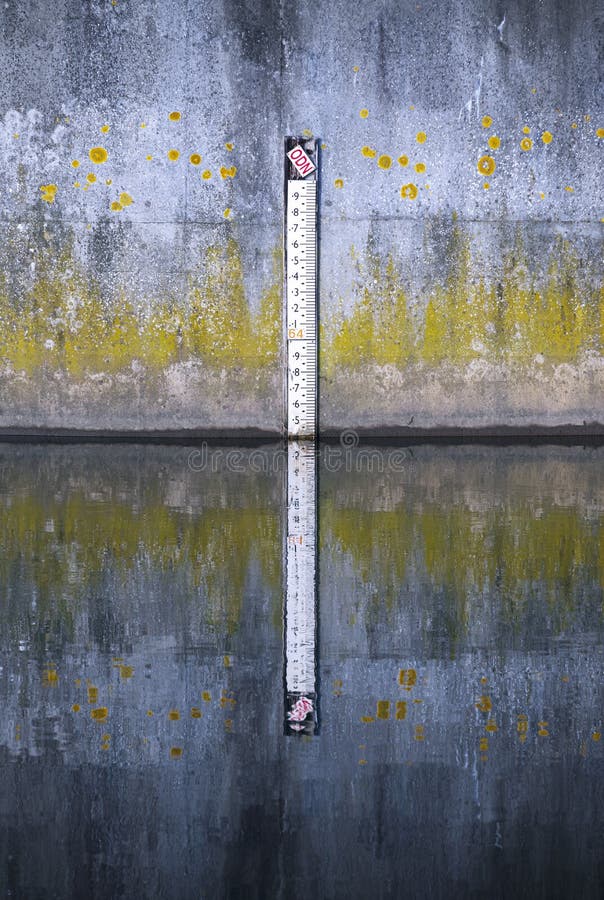 Water Level Depth Meter Ruler and Its Reflection Stock Photo - Image of ...