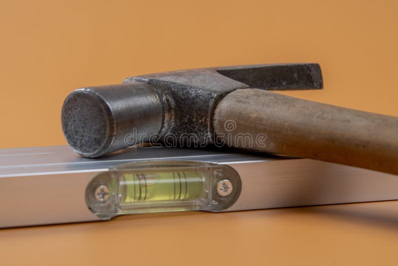 Water Level and Hammer Used by Mason in Civil Construction Work Stock ...