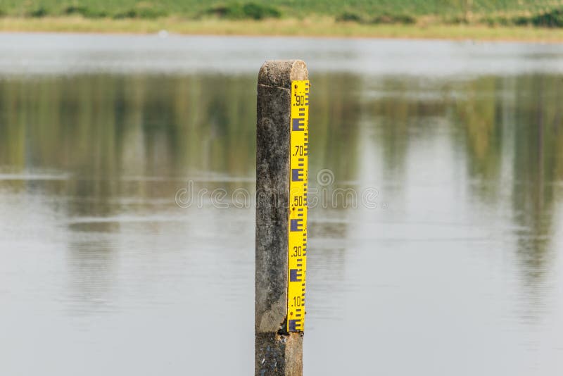 Water Level Indicator at the Waterway or Swamp. Stock Photo - Image of ...