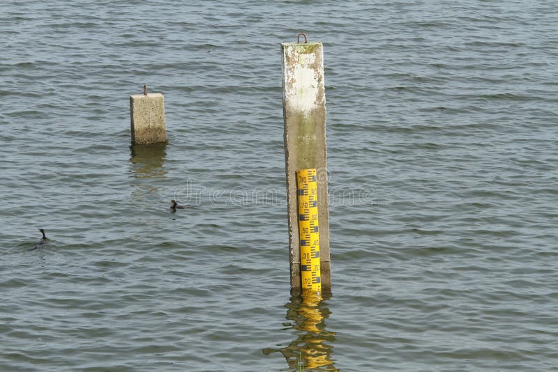 Water level pole stock photo. Image of gauge, flood - 100111294