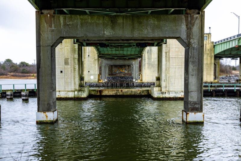Water-level Shot of the Underside of a Bridge. Stock Image - Image of ...