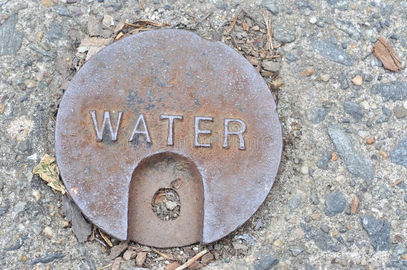 Water Utility Cover stock photo. Image of rust, cover, metal - 97634