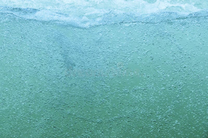 Water with Many Small Water Bubbles, Bubbling in Turquoise Stock Photo ...
