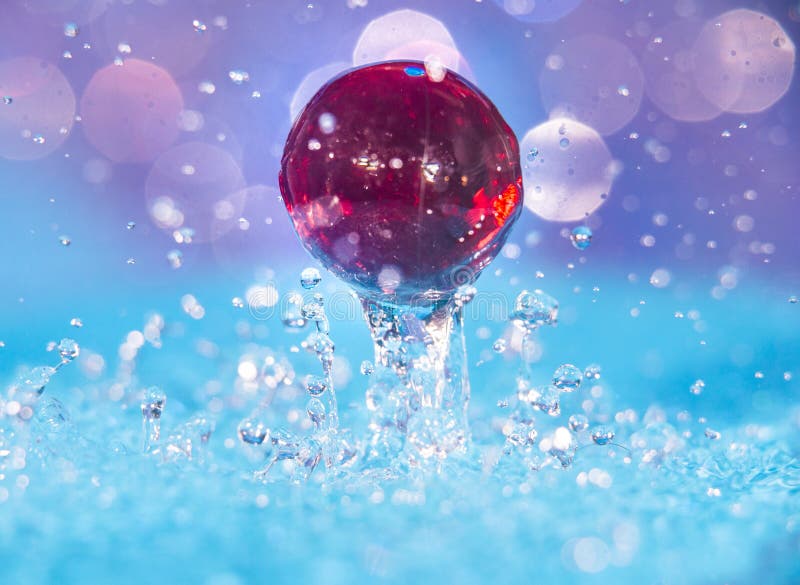 Marbles falling in water. stock photo. Image of water - 4166234
