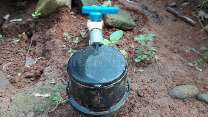 Water Meter and Water Valve Stock Photo - Image of asphalt, iron: 256042208