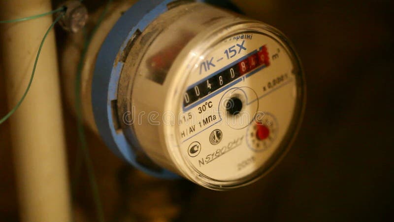 A Water Meter within a Plumbing Setting. the Dusty Pipes, Fittings, and ...