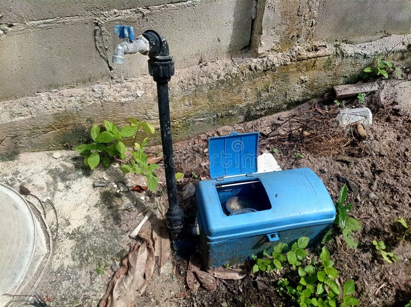 Water Meter and Water Tap beside the House Stock Photo - Image of pond ...