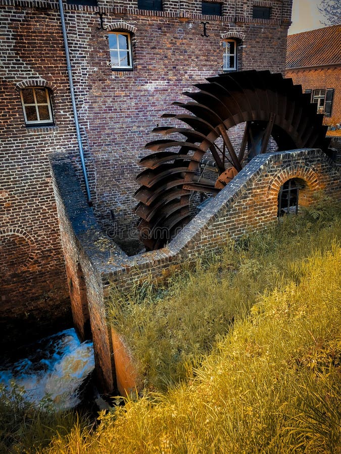 Water Mill stock photo. Image of plan, iron, water, gras - 275567172