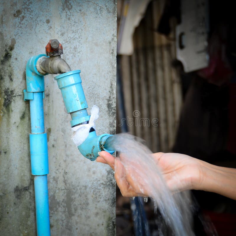 Water from an old PVC tap. stock photo. Image of life - 208877548