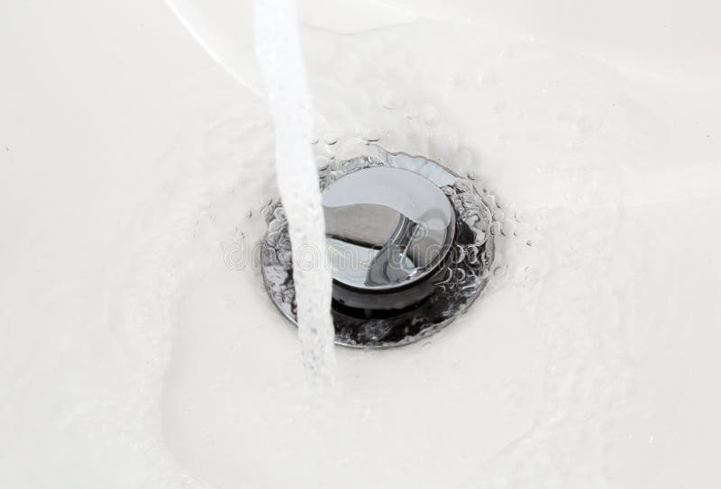 Water Outflow from the Washbasin Which is Foaming Stock Image - Image ...