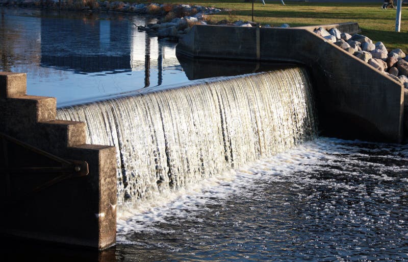 Water over a Dam stock image. Image of resevoir, waterfall - 137341263