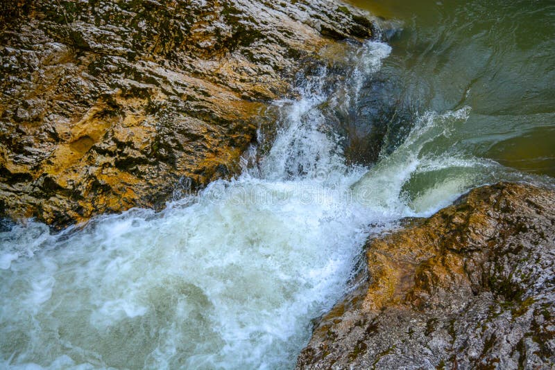 Water Over the Rock Flows into a Mountain Stream Stock Image - Image of ...