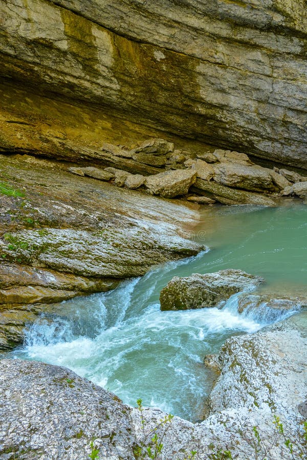 Water Over the Rock Flows into a Mountain Stream Stock Image - Image of ...