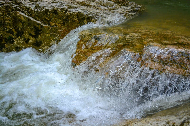 Water Over the Rock Flows into a Mountain Stream Stock Image - Image of ...