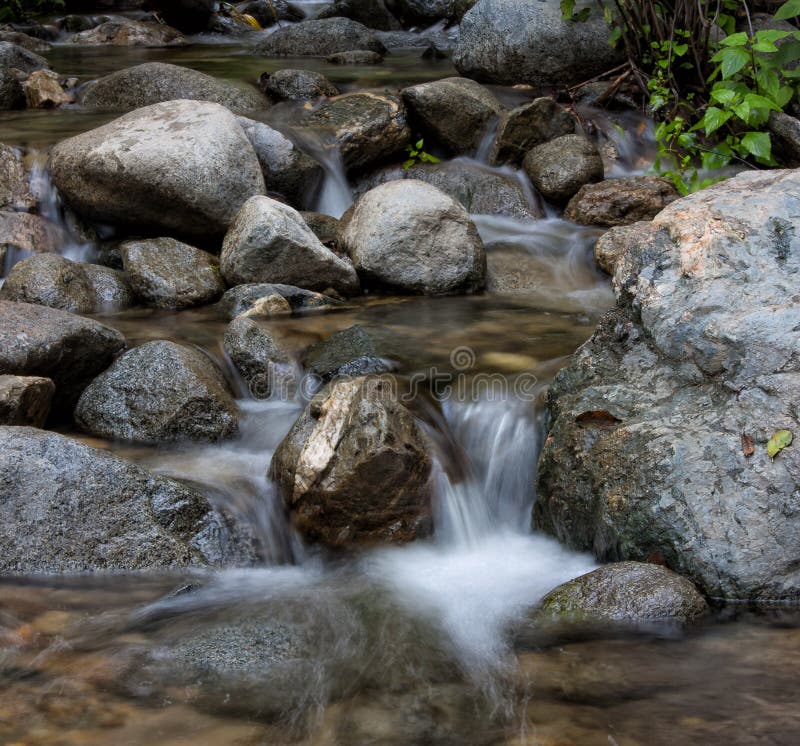 Water over Rocks stock image. Image of fluffy, eaton - 26093943