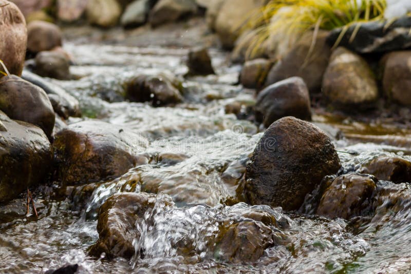 Water Flowing Over Stones during a Winter Thaw Stock Image - Image of ...