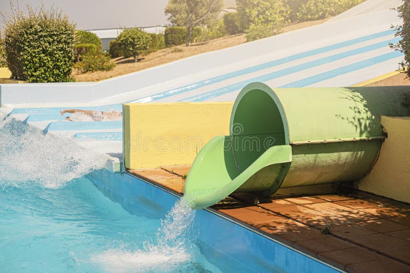 Water Park, Bright Slides with a Pool. a Water Park on a Summer Day ...