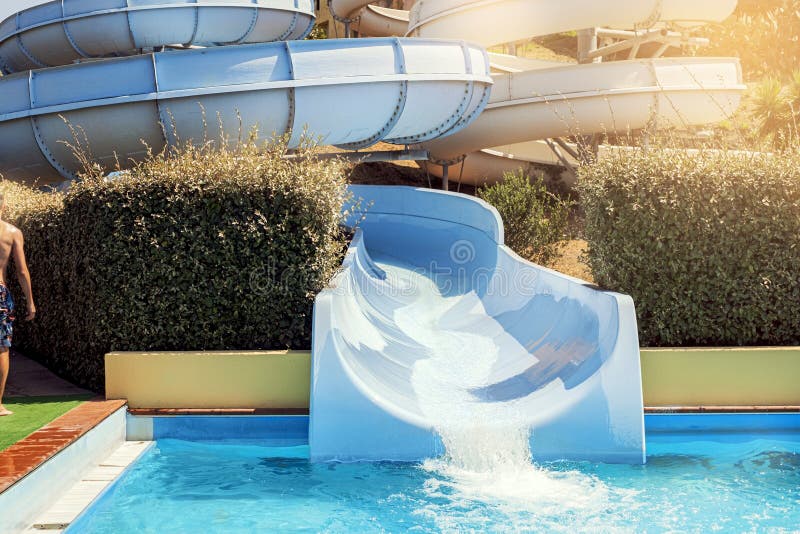 Water Park, Bright Slides with a Pool. a Water Park on a Summer Day ...