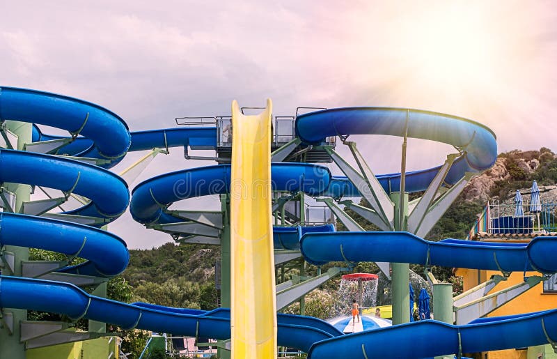 Water Park with Colorful Slides and Pools. Stock Image - Image of ...