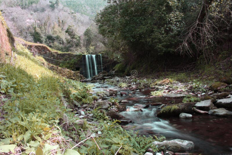 Water Path with Silk Effect. Small River Flowing from the Waterfall in ...