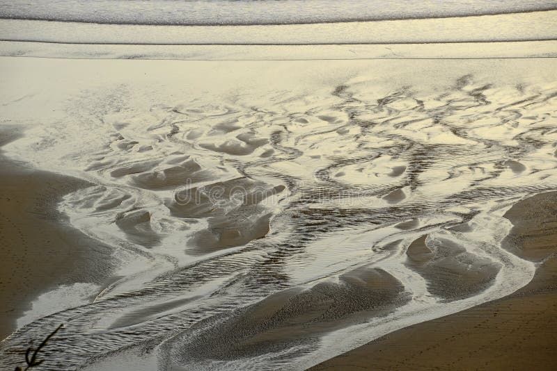 Water pattern on sand stock photo. Image of delta, flow - 54022938