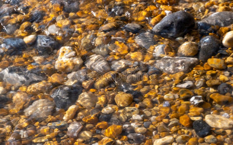 Water and pebbles stock photo. Image of water, shoreline - 182557042
