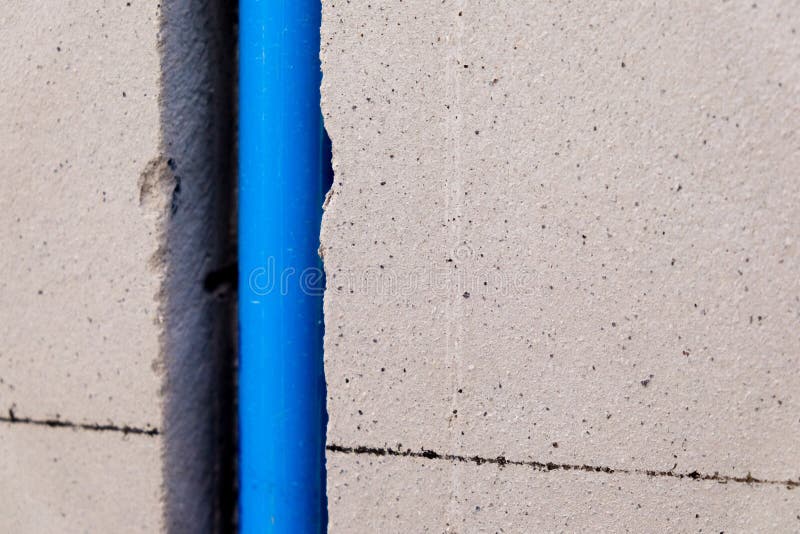 Water Pipe in Aerated Brick Wall Stock Photo - Image of piping, sewer ...