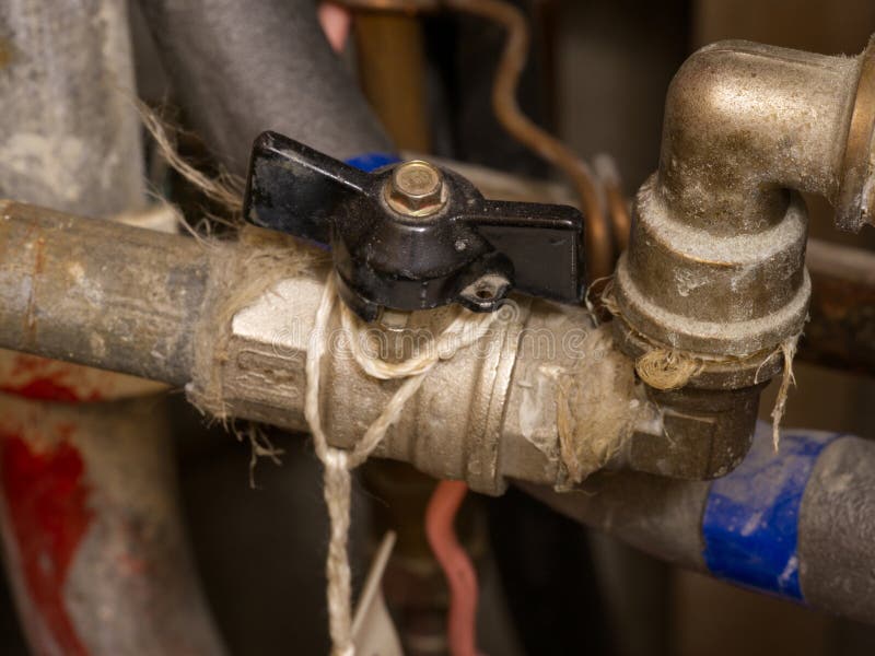 A Water Pipe with a Black Switch. Close Stock Photo - Image of ...