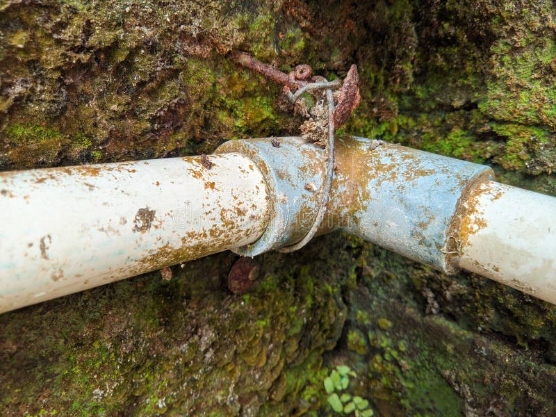 Water Pipe Connected by Elbow Were Attached To Old Walls with Rusty ...