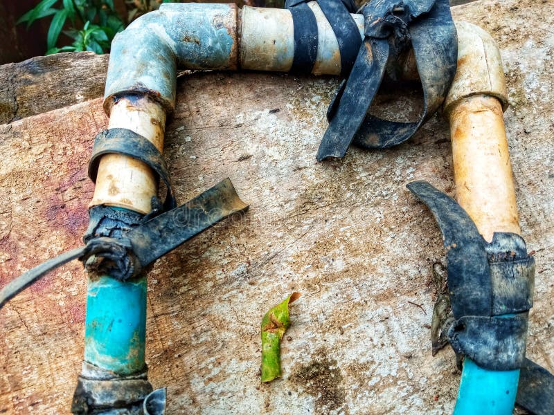 Water pipe connection stock image. Image of green, iron - 207700393